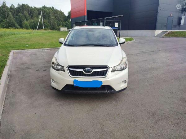 White Subaru XV 2013 in Siauliai, with an engine capacity of 2.00 L and mileage of 220 thousand km for 6500 €, photo 7 on AUTOMOTO.COM.LV