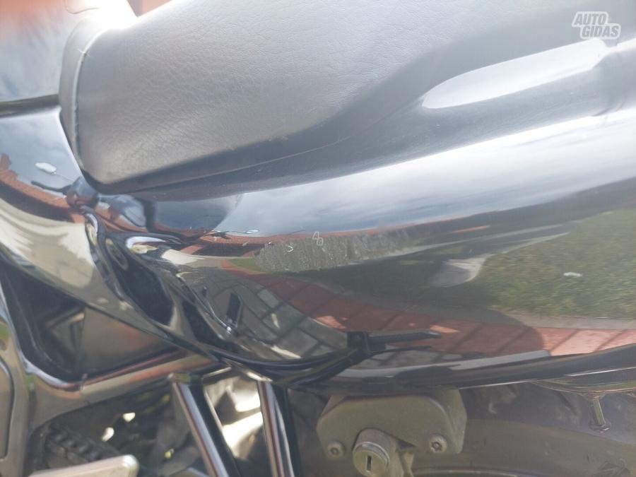 Black Suzuki Bandit 1998 in Klaipeda, with an engine capacity of 0.60 L and mileage of 765 thousand km for 1350 €, photo 11 on AUTOMOTO.COM.LV