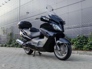 Melns Suzuki Burgman 2008 Klaipėda, ar dzinēja tilpumu 0.65 L un nobraukumu 33 tūkst. km par 3000 €, foto  vietnē AUTOMOTO.COM.LV