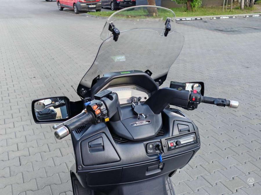 Черный Сузуки Burgman 2008 в Клайпеда, объемом двигателя 0.65 л и пробегом 33 тыс. км за 3000 €, фото 11 на AUTOMOTO.COM.LV