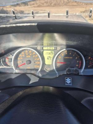 Melns Suzuki Burgman 2012 Viļņa, ar dzinēja tilpumu 0.40 L un nobraukumu 25 tūkst. km par 1900 €, foto  vietnē AUTOMOTO.COM.LV