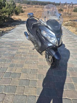 Melns Suzuki Burgman 2012 Viļņa, ar dzinēja tilpumu 0.40 L un nobraukumu 25 tūkst. km par 1900 €, foto 7 vietnē AUTOMOTO.COM.LV