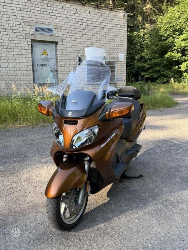 Brown Suzuki Burgman 2007 in Vilnius, with an engine capacity of 0.65 L and mileage of 7 thousand km for 2700 €, photo 1 on AUTOMOTO.COM.LV