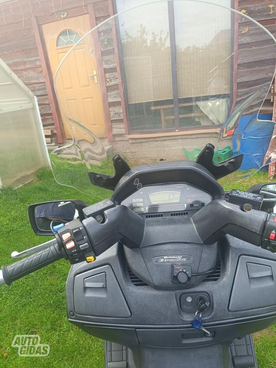 Grey Suzuki Burgman 2007 in Vilnius, with an engine capacity of 0.65 L and mileage of 48 thousand km for 1599 €, photo 8 on AUTOMOTO.COM.LV