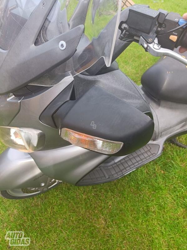 Grey Suzuki Burgman 2007 in Vilnius, with an engine capacity of 0.65 L and mileage of 48 thousand km for 1599 €, photo 9 on AUTOMOTO.COM.LV