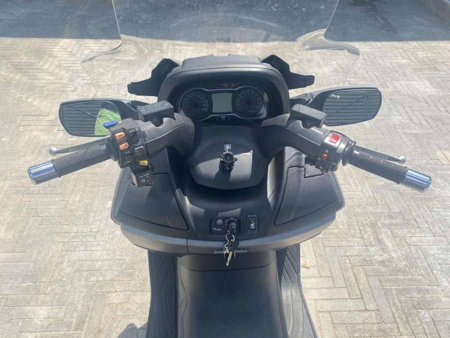 Grey Suzuki Burgman 2013 in Vilnius, with an engine capacity of 0.64 L and mileage of 25 thousand km for 3900 €, photo 5 on AUTOMOTO.COM.LV