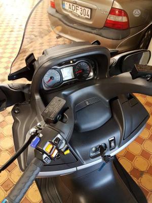 Grey Suzuki Burgman 2018 in Kaunas, with an engine capacity of 0.64 L and mileage of 10 thousand km for 6200 €, photo 6 on AUTOMOTO.COM.LV