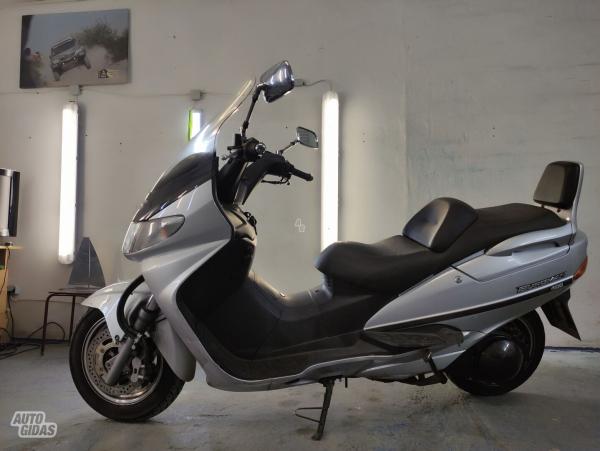 Suzuki Burgman 1999 Utena, ar dzinēja tilpumu 0.00 L un nobraukumu 49 tūkst. km par 1100 €, foto 5 vietnē AUTOMOTO.COM.LV