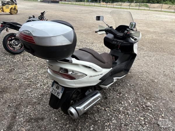 Suzuki Burgman 2009 Kelmė, ar dzinēja tilpumu 0.40 L un nobraukumu 60 tūkst. km par 915 €, foto 3 vietnē AUTOMOTO.COM.LV
