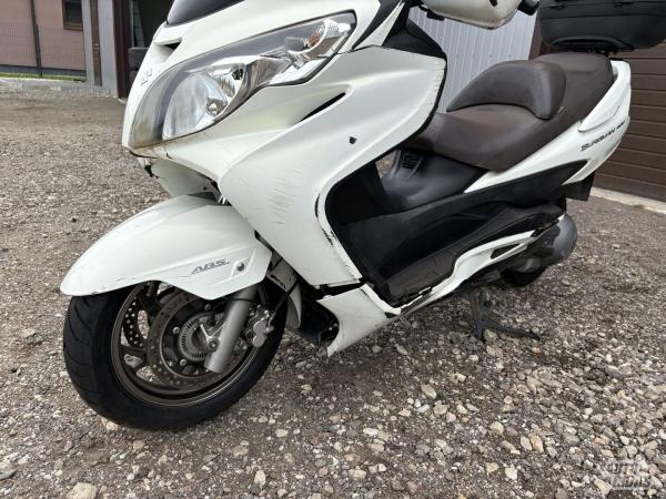 Suzuki Burgman 2009 Kelmė, ar dzinēja tilpumu 0.40 L un nobraukumu 60 tūkst. km par 915 €, foto 8 vietnē AUTOMOTO.COM.LV