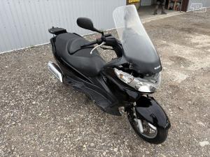 Suzuki Burgman 2010 Kelmė, ar dzinēja tilpumu 0.13 L un nobraukumu 23 tūkst. km par 515 €, foto  vietnē AUTOMOTO.COM.LV