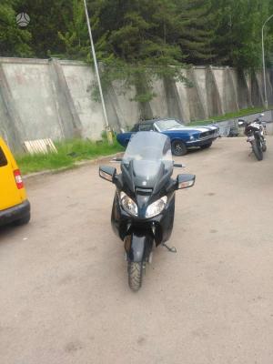 Suzuki Burgman 2010 Viļņa, ar dzinēja tilpumu 0.65 L un nobraukumu 21 tūkst. km par 2999 €, foto 3 vietnē AUTOMOTO.COM.LV