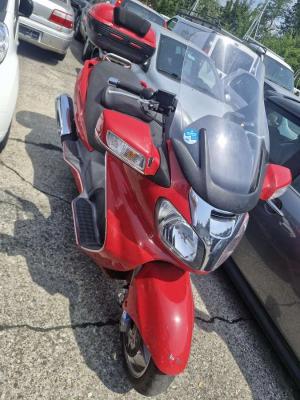 Red Suzuki Burgman 2003 in Vilnius, with an engine capacity of 0.64 L and mileage of 80 thousand km for 950 €, photo  on AUTOMOTO.COM.LV
