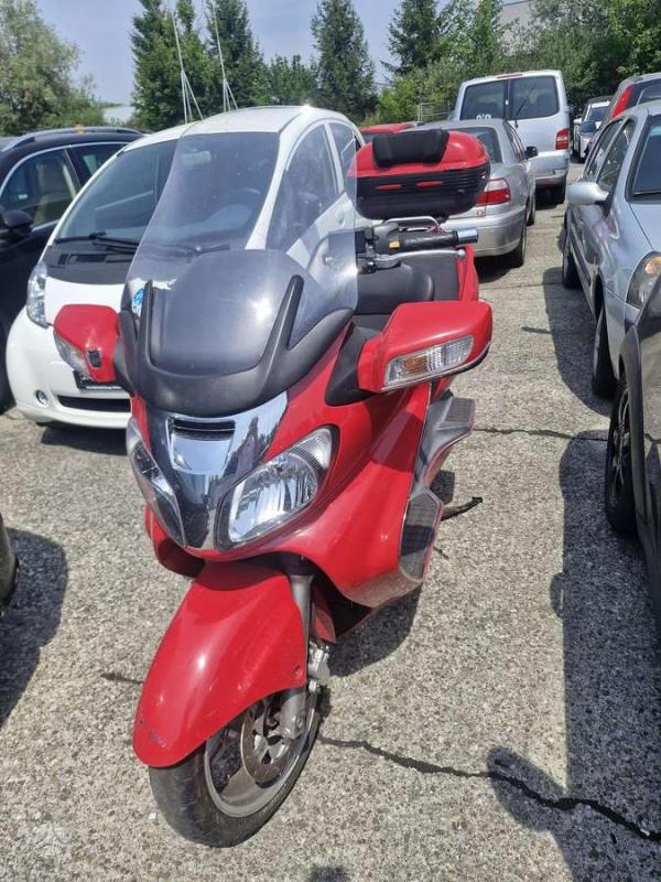 Red Suzuki Burgman 2003 in Vilnius, with an engine capacity of 0.64 L and mileage of 80 thousand km for 950 €, photo 2 on AUTOMOTO.COM.LV