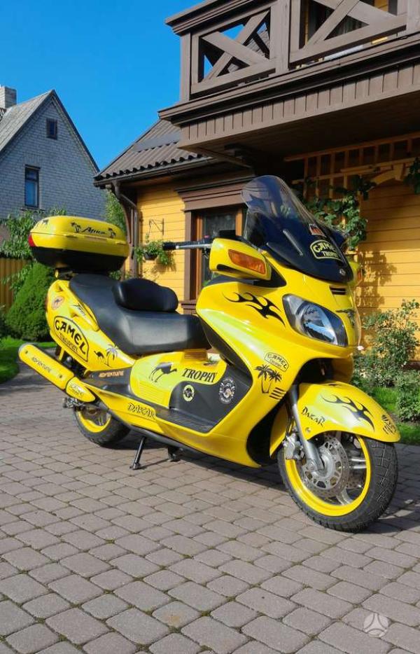 Dzeltens Suzuki Burgman 2003 Kelmė, ar dzinēja tilpumu 0.65 L un nobraukumu 57 tūkst. km par 2300 €, foto 1 vietnē AUTOMOTO.COM.LV