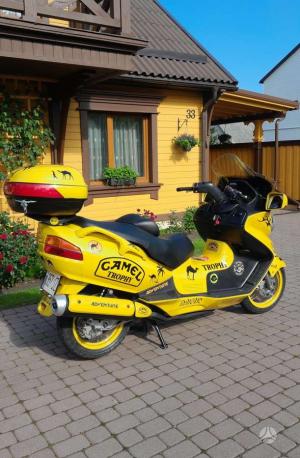 Dzeltens Suzuki Burgman 2003 Kelmė, ar dzinēja tilpumu 0.65 L un nobraukumu 57 tūkst. km par 2300 €, foto 3 vietnē AUTOMOTO.COM.LV