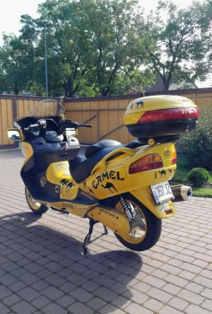 Dzeltens Suzuki Burgman 2003 Kelmė, ar dzinēja tilpumu 0.65 L un nobraukumu 57 tūkst. km par 2300 €, foto 5 vietnē AUTOMOTO.COM.LV