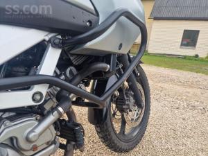 Suzuki DL 650 2004 Ogre, ar dzinēja tilpumu 0.65 L un nobraukumu 0 tūkst. km par 2400 €, foto 7 vietnē AUTOMOTO.COM.LV