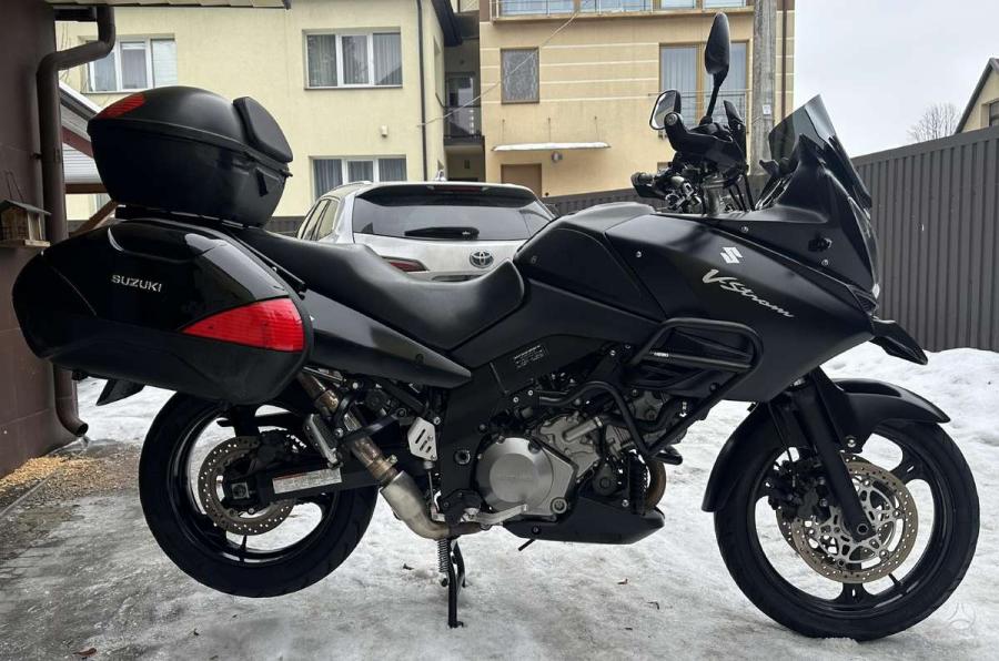 Melns Suzuki DL 2005 Kauņa, ar dzinēja tilpumu 1.00 L un nobraukumu 70 tūkst. km par 2850 €, foto 5 vietnē AUTOMOTO.COM.LV