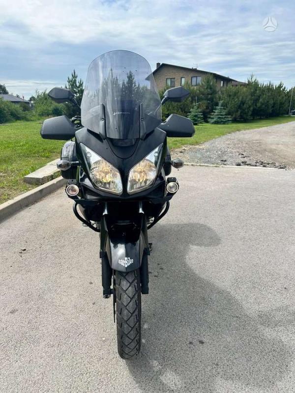 Black Suzuki DL 2005 in Panevezys, with an engine capacity of 1.00 L and mileage of 68 thousand km for 3800 €, photo 3 on AUTOMOTO.COM.LV