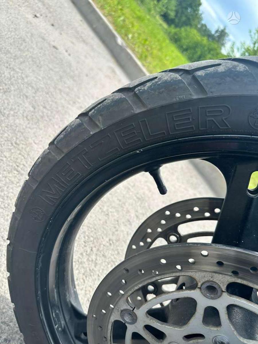 Melns Suzuki DL 2005 Panevēža, ar dzinēja tilpumu 1.00 L un nobraukumu 68 tūkst. km par 3800 €, foto 16 vietnē AUTOMOTO.COM.LV