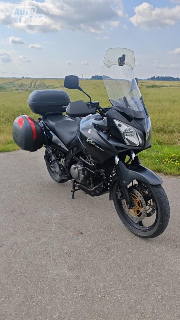 Black Suzuki DL 2005 in Panevezys, with an engine capacity of 0.65 L and mileage of 115 thousand km for 3900 €, photo 2 on AUTOMOTO.COM.LV