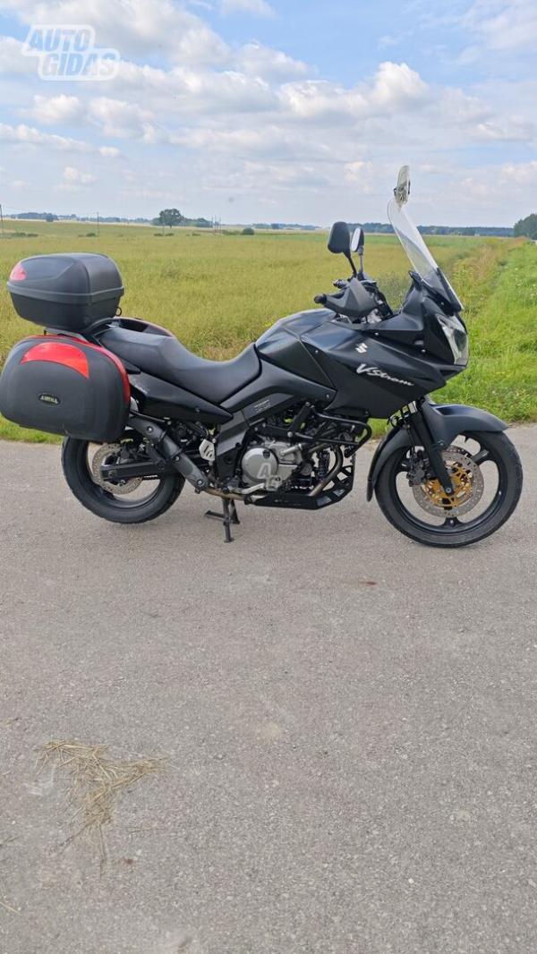 Black Suzuki DL 2005 in Panevezys, with an engine capacity of 0.65 L and mileage of 115 thousand km for 3900 €, photo 3 on AUTOMOTO.COM.LV