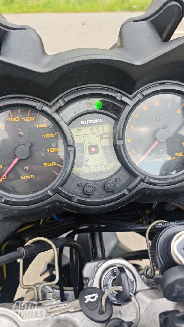 Black Suzuki DL 2005 in Panevezys, with an engine capacity of 0.65 L and mileage of 115 thousand km for 3900 €, photo 8 on AUTOMOTO.COM.LV