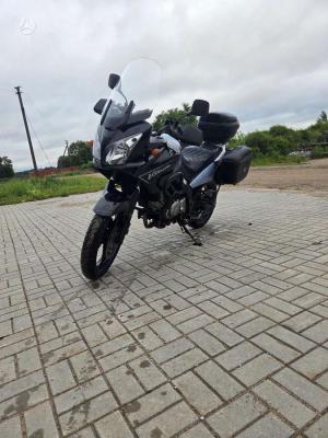 Black Suzuki DL 2006 in Taurage, with an engine capacity of 0.65 L and mileage of 71 thousand km for 2750 €, photo  on AUTOMOTO.COM.LV
