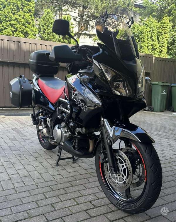 Black Suzuki DL 2007 in Kaunas, with an engine capacity of 1.00 L and mileage of 59 thousand km for 3850 €, photo 1 on AUTOMOTO.COM.LV
