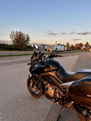 Black Suzuki DL 2008 in Vilnius, with an engine capacity of 1.00 L and mileage of 60 thousand km for 3150 €, photo  on AUTOMOTO.COM.LV