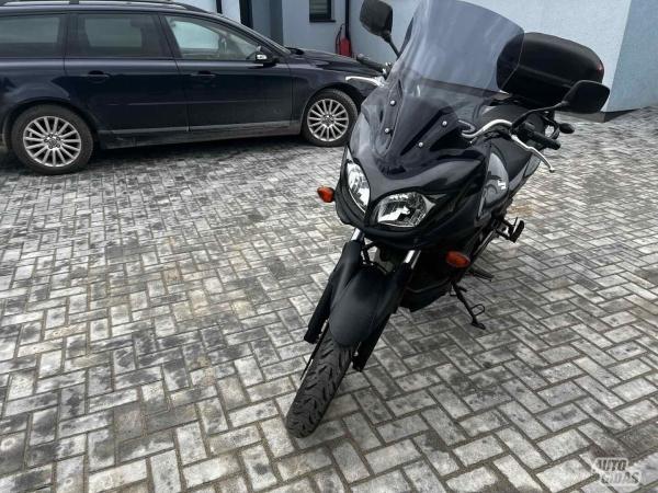 Melns Suzuki DL 2013 Šauļi, ar dzinēja tilpumu 0.65 L un nobraukumu 54 tūkst. km par 3700 €, foto 7 vietnē AUTOMOTO.COM.LV