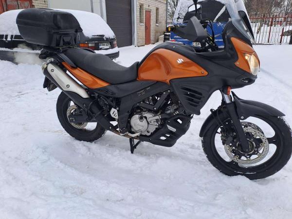 Orange Suzuki DL 2012 in Panevezys, with an engine capacity of 0.65 L and mileage of 29 thousand km for 3900 €, photo 5 on AUTOMOTO.COM.LV