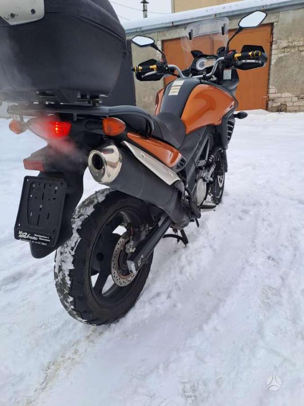 Orange Suzuki DL 2012 in Panevezys, with an engine capacity of 0.65 L and mileage of 29 thousand km for 3900 €, photo 9 on AUTOMOTO.COM.LV