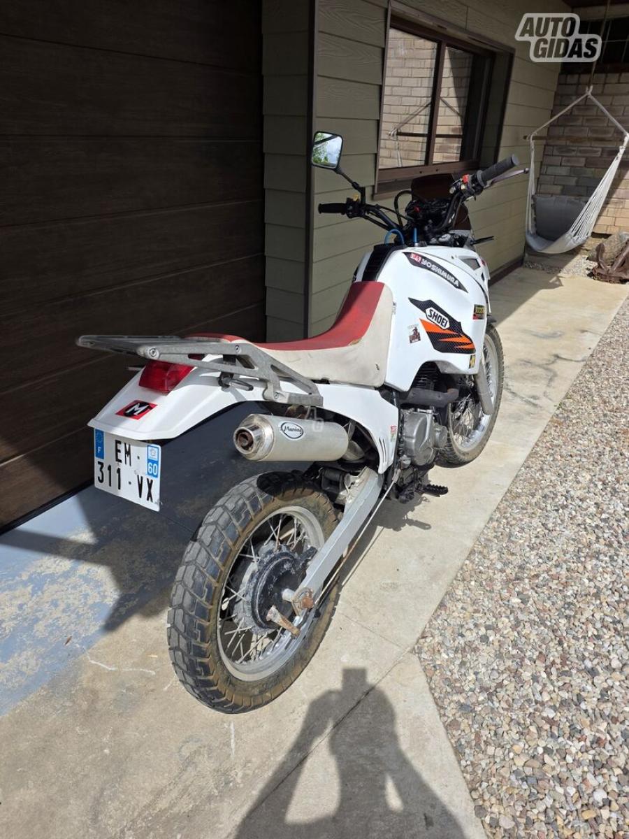 White Suzuki DR 1990 in Pasvalys, with an engine capacity of 0.75 L and mileage of 45 thousand km for 999 €, photo 7 on AUTOMOTO.COM.LV