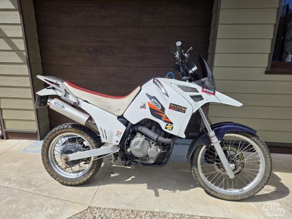 Balts Suzuki DR 1990 Pasvalys, ar dzinēja tilpumu 0.75 L un nobraukumu 45 tūkst. km par 999 €, foto 10 vietnē AUTOMOTO.COM.LV