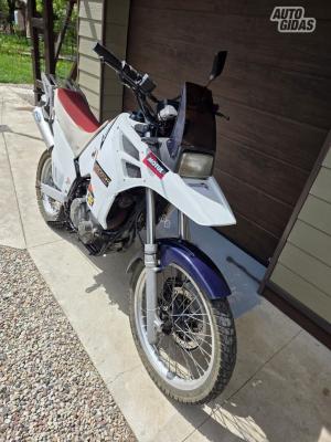 White Suzuki DR 1990 in Pasvalys, with an engine capacity of 0.75 L and mileage of 45 thousand km for 999 €, photo 12 on AUTOMOTO.COM.LV