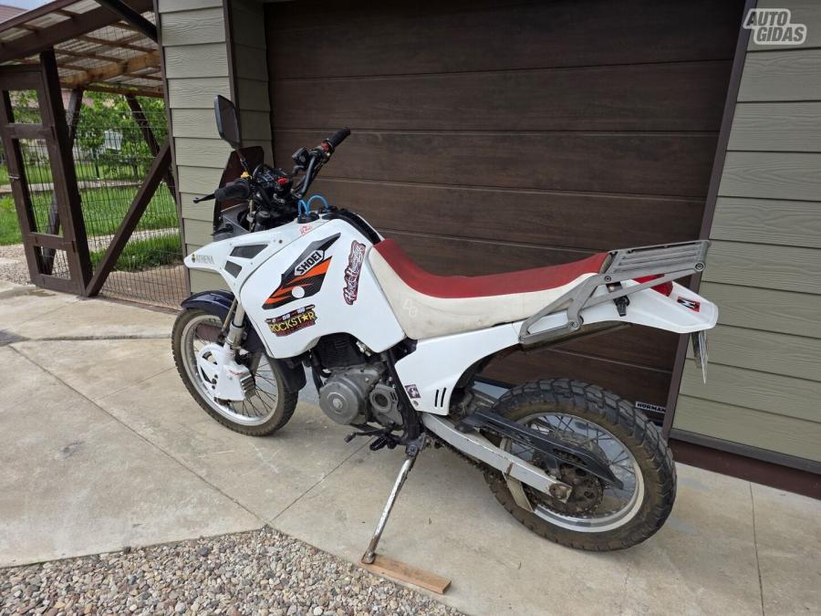 White Suzuki DR 1990 in Pasvalys, with an engine capacity of 0.75 L and mileage of 45 thousand km for 999 €, photo 17 on AUTOMOTO.COM.LV