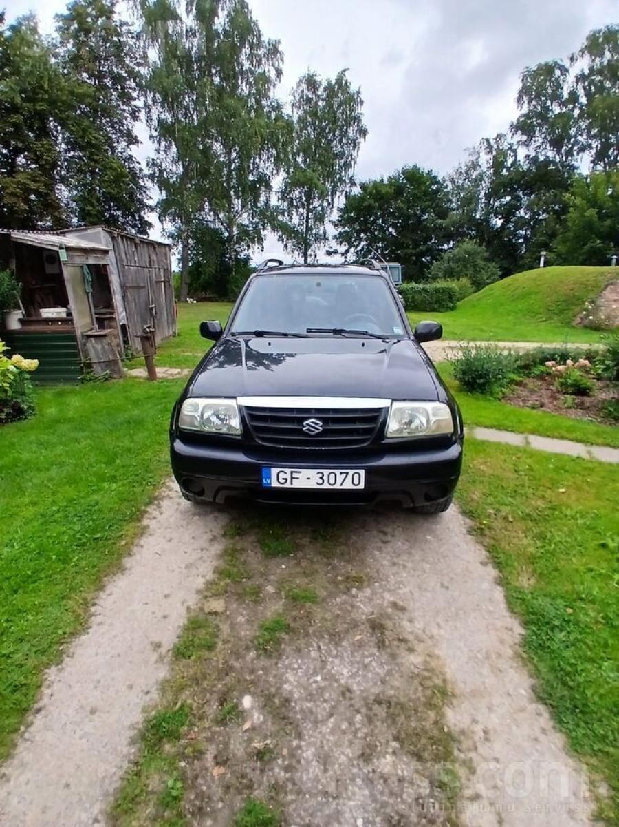Black Suzuki grand-vitara 2005 in Bauska, with an engine capacity of 2.00 L and mileage of 214 thousand km for 3150 €, photo 1 on AUTOMOTO.COM.LV