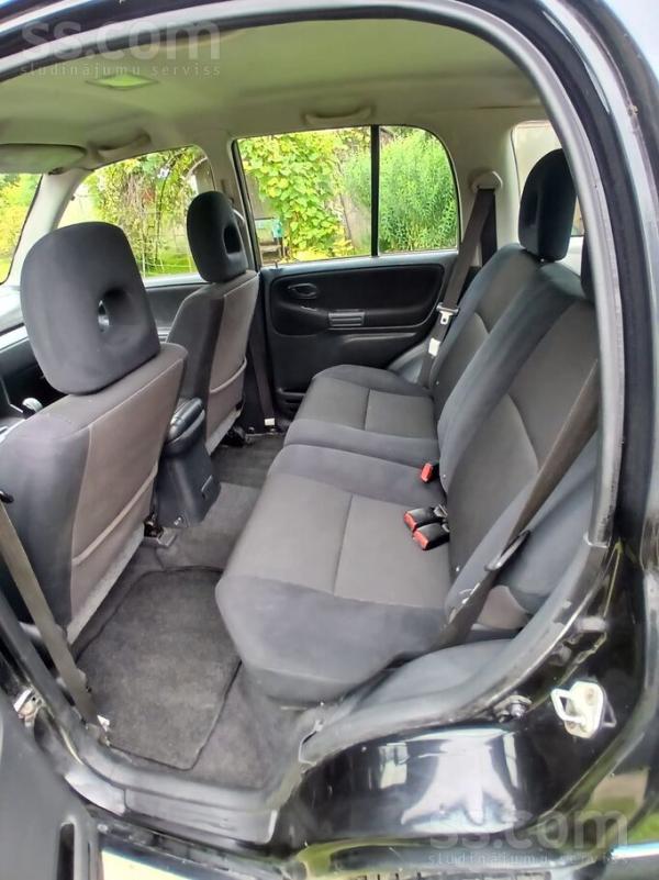 Black Suzuki grand-vitara 2005 in Bauska, with an engine capacity of 2.00 L and mileage of 214 thousand km for 3150 €, photo 6 on AUTOMOTO.COM.LV