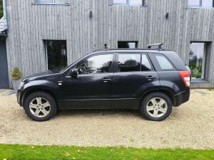 Black Suzuki grand-vitara 2006 in Birzai, with an engine capacity of 1.87 L and mileage of 290 thousand km for 1900 €, photo 5 on AUTOMOTO.COM.LV