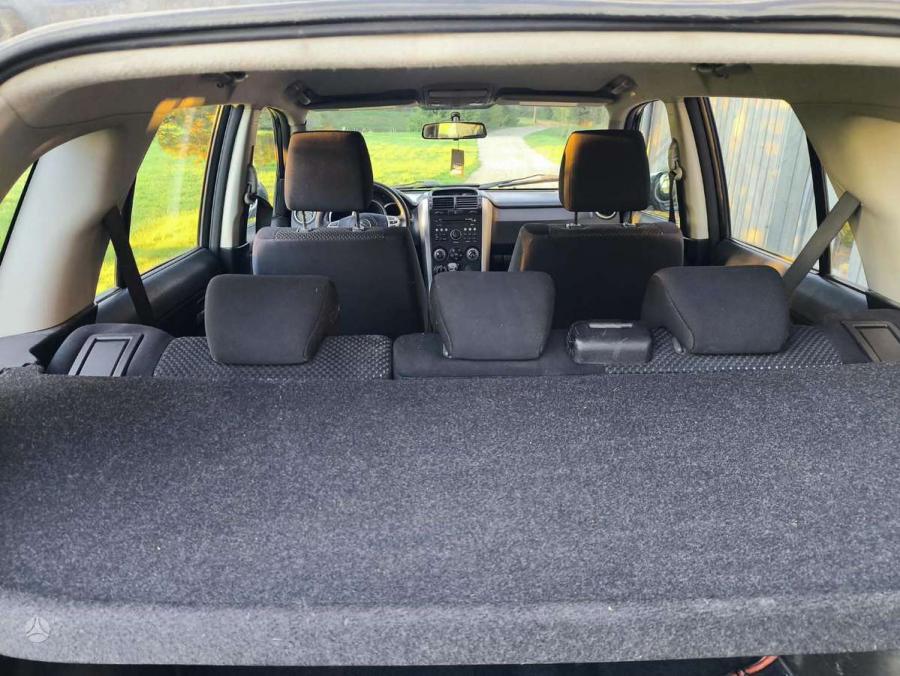 Black Suzuki grand-vitara 2006 in Birzai, with an engine capacity of 1.87 L and mileage of 290 thousand km for 1900 €, photo 9 on AUTOMOTO.COM.LV