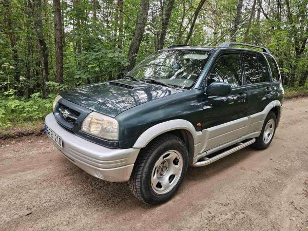 Green Suzuki grand-vitara 1998 in Utena, with an engine capacity of 2.00 L and mileage of 258 thousand km for 950 €, photo 1 on AUTOMOTO.COM.LV