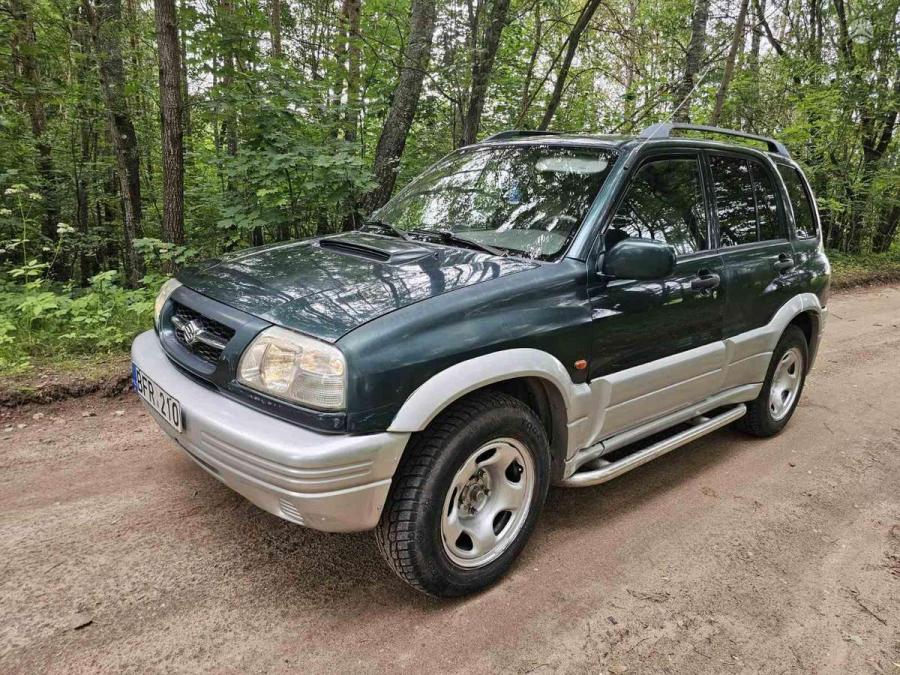 Green Suzuki grand-vitara 1998 in Utena, with an engine capacity of 2.00 L and mileage of 258 thousand km for 950 €, photo 1 on AUTOMOTO.COM.LV