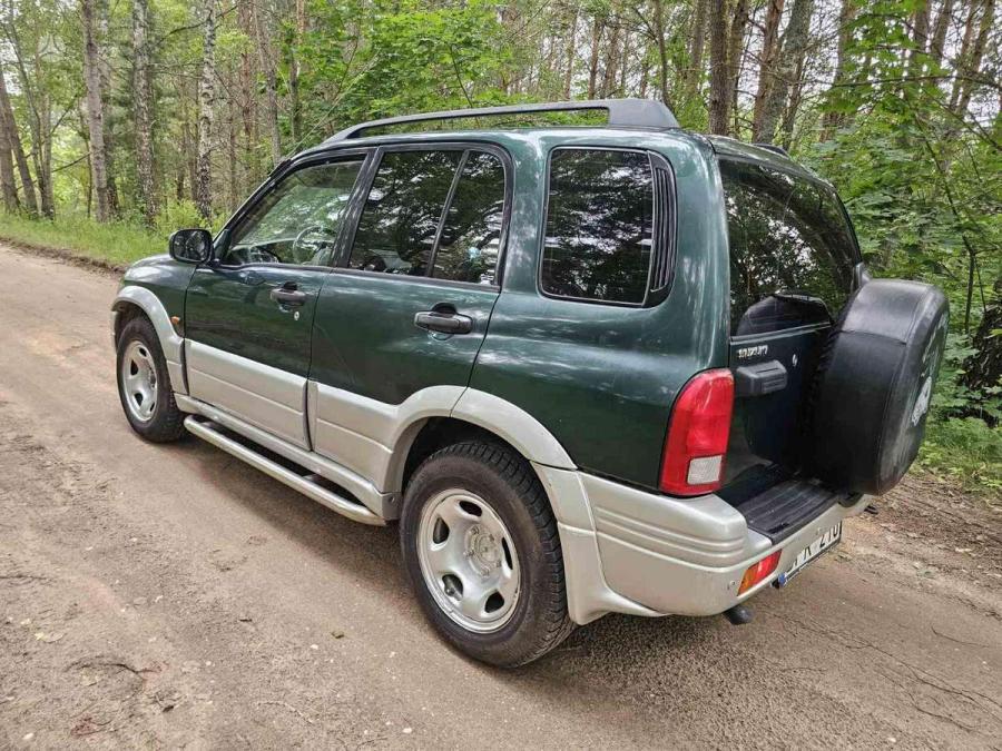 Green Suzuki grand-vitara 1998 in Utena, with an engine capacity of 2.00 L and mileage of 258 thousand km for 950 €, photo 4 on AUTOMOTO.COM.LV