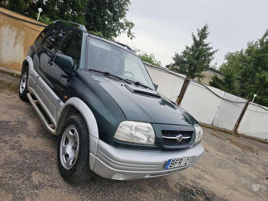 Green Suzuki grand-vitara 1998 in Utena, with an engine capacity of 2.00 L and mileage of 258 thousand km for 950 €, photo 7 on AUTOMOTO.COM.LV