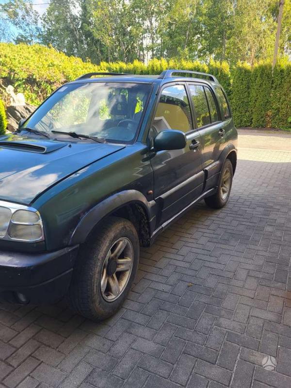 Green Suzuki grand-vitara 2003 in Radviliskis, with an engine capacity of 2.00 L and mileage of 310 thousand km for 1300 €, photo 2 on AUTOMOTO.COM.LV