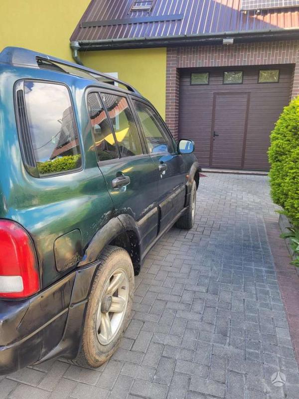 Green Suzuki grand-vitara 2003 in Radviliskis, with an engine capacity of 2.00 L and mileage of 310 thousand km for 1300 €, photo 3 on AUTOMOTO.COM.LV