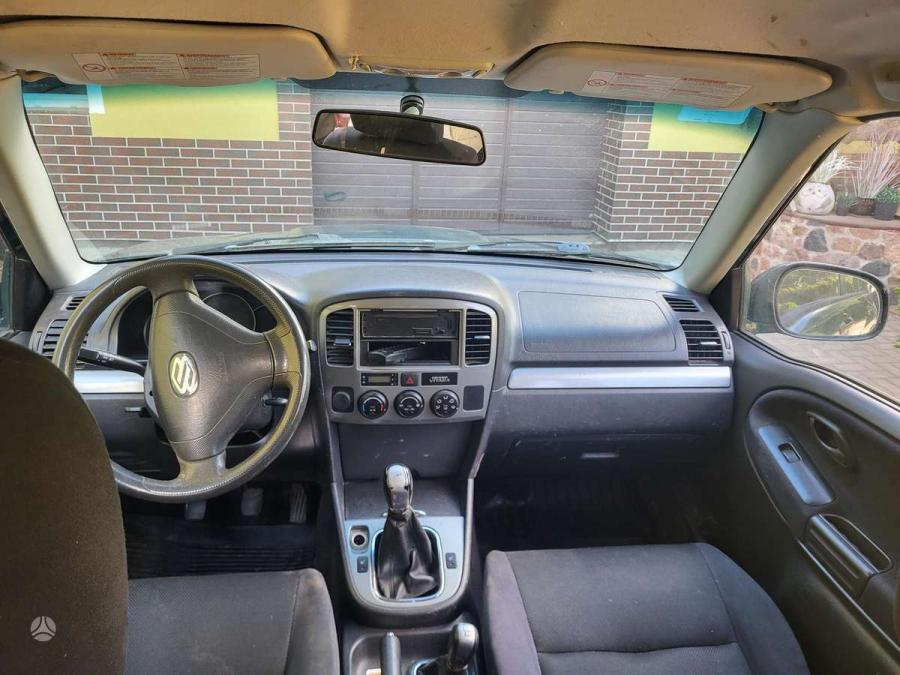 Green Suzuki grand-vitara 2003 in Radviliskis, with an engine capacity of 2.00 L and mileage of 310 thousand km for 1300 €, photo 8 on AUTOMOTO.COM.LV