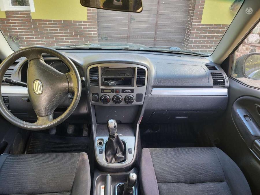 Green Suzuki grand-vitara 2003 in Radviliskis, with an engine capacity of 2.00 L and mileage of 310 thousand km for 1300 €, photo 9 on AUTOMOTO.COM.LV